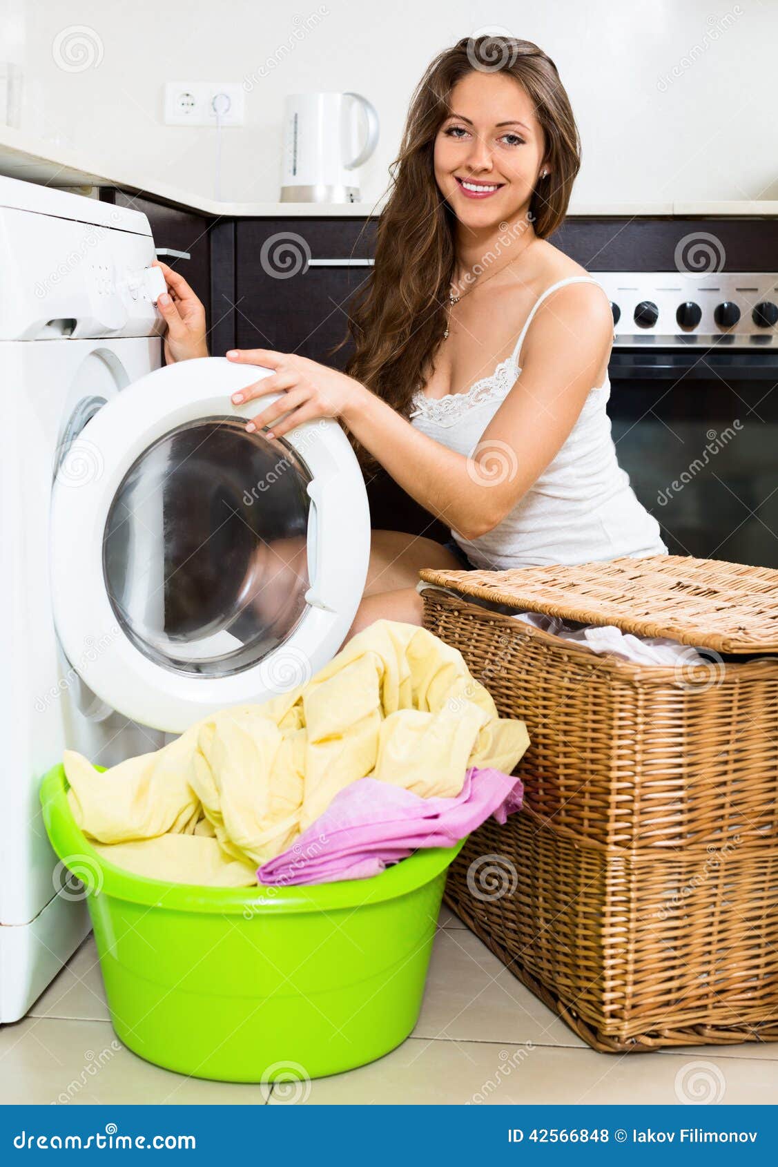 Nice Woman Washing Clothes in Washer Stock Photo - Image of person ...