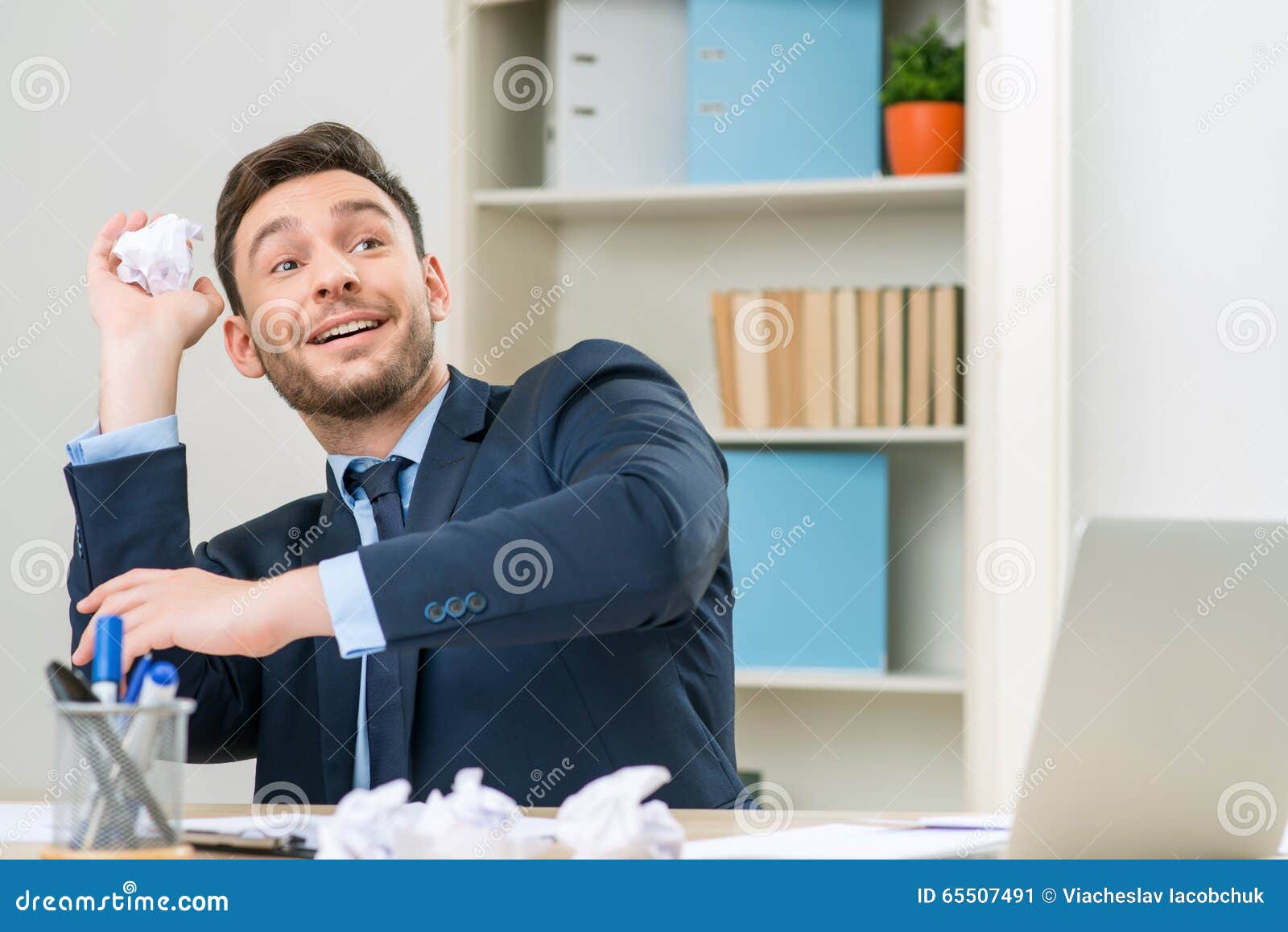 Nice Worker Playing with Paper at the Table Stock Image - Image of ...
