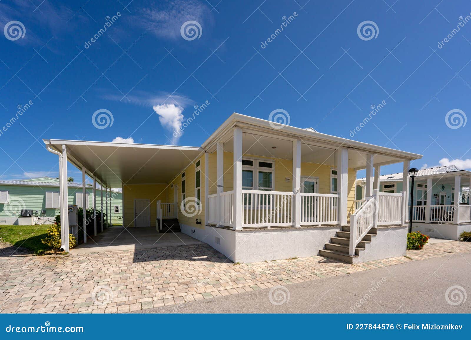 Nice Yellow and White Mobile Home with Covered Parking Stock Photo ...