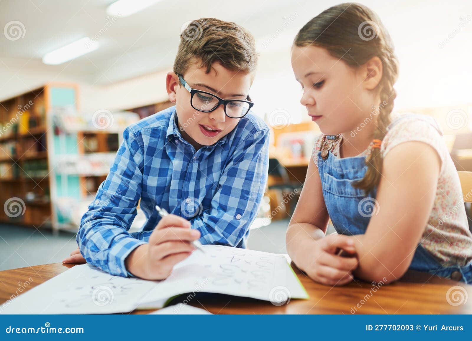 So Nice of You To Help. Two Young Children Working Together Inside of a ...