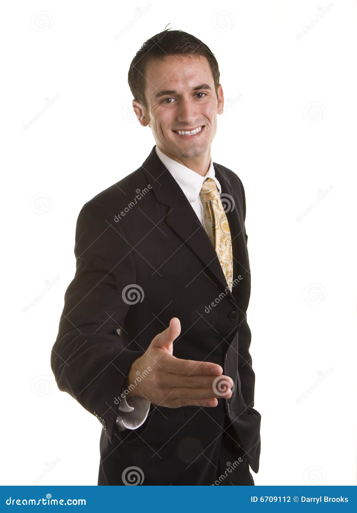 Nice Young Man in Business Suit Extending Hand Stock Photo - Image of ...