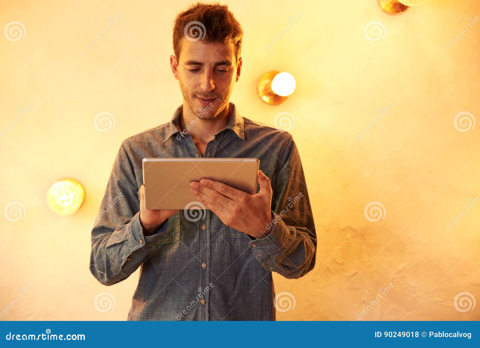 Nice Young Man Texting on Tablet Stock Photo - Image of activity ...