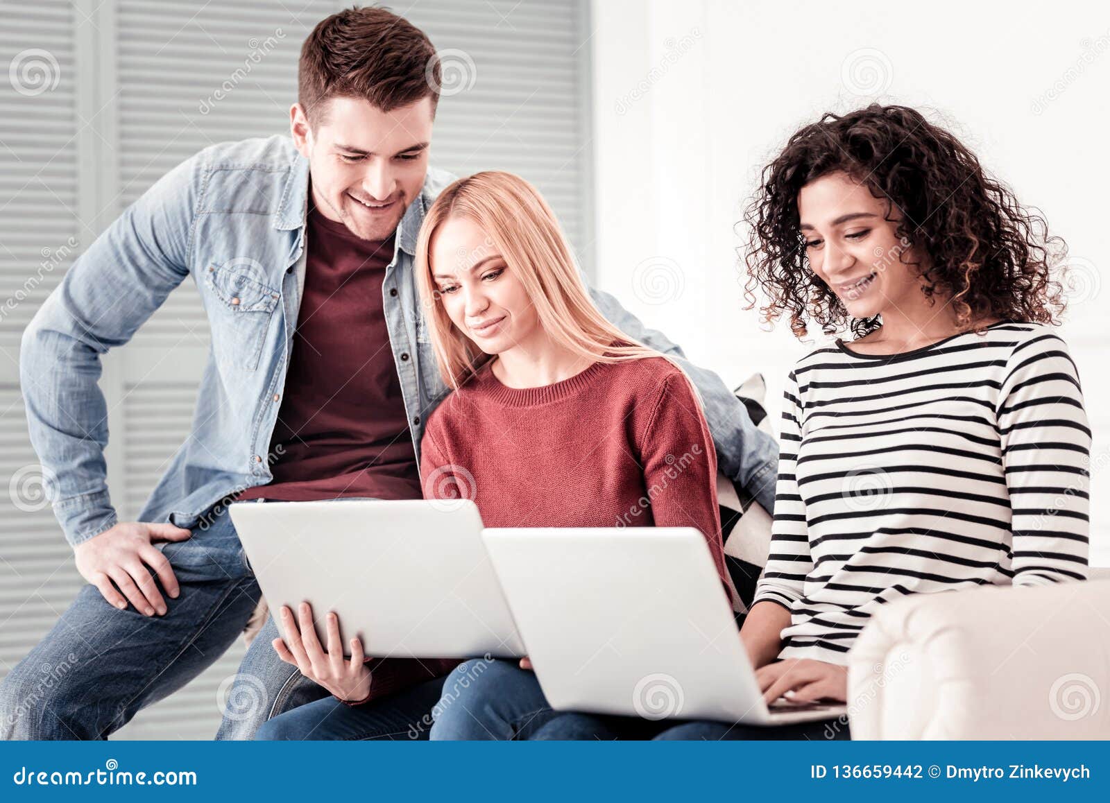 Nice Young People Using Their Laptops Stock Photo - Image of generation ...