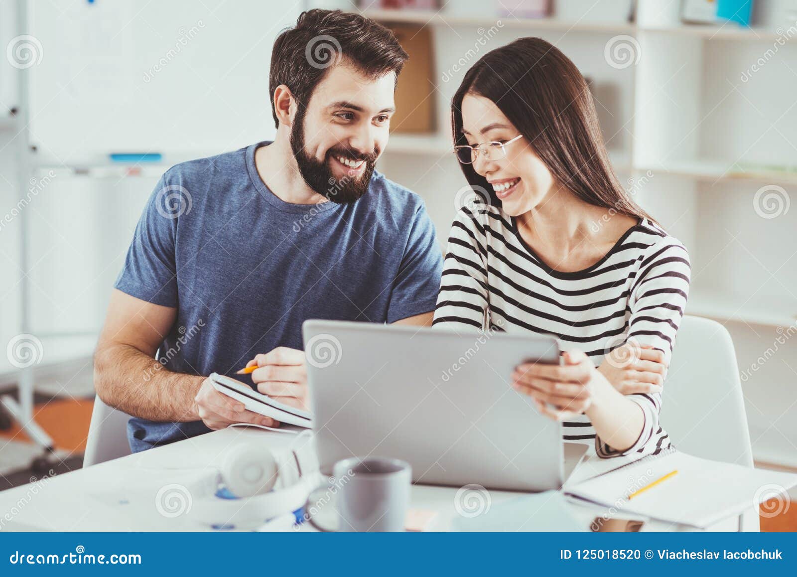 Nice Young Students Sitting in Front of the Laptop Stock Photo - Image ...