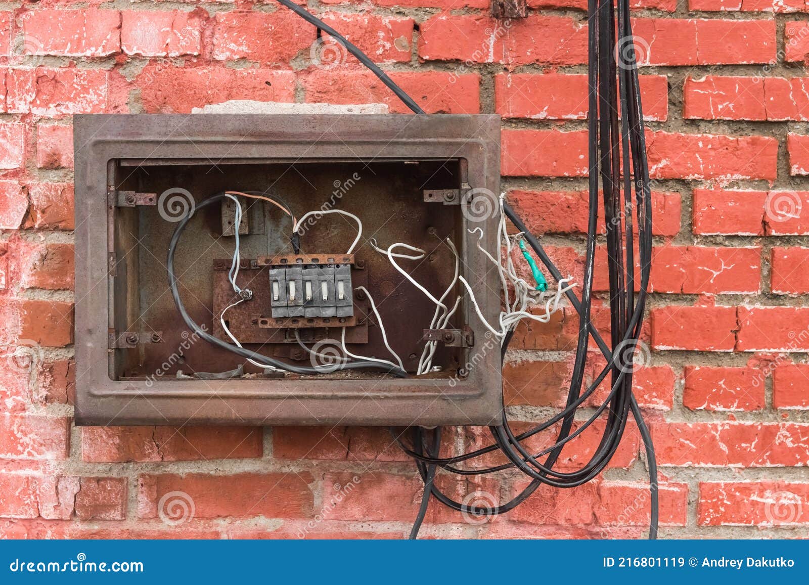 Niche Of An Old Broken Electrical Panel On The Background Of An Old Red ...