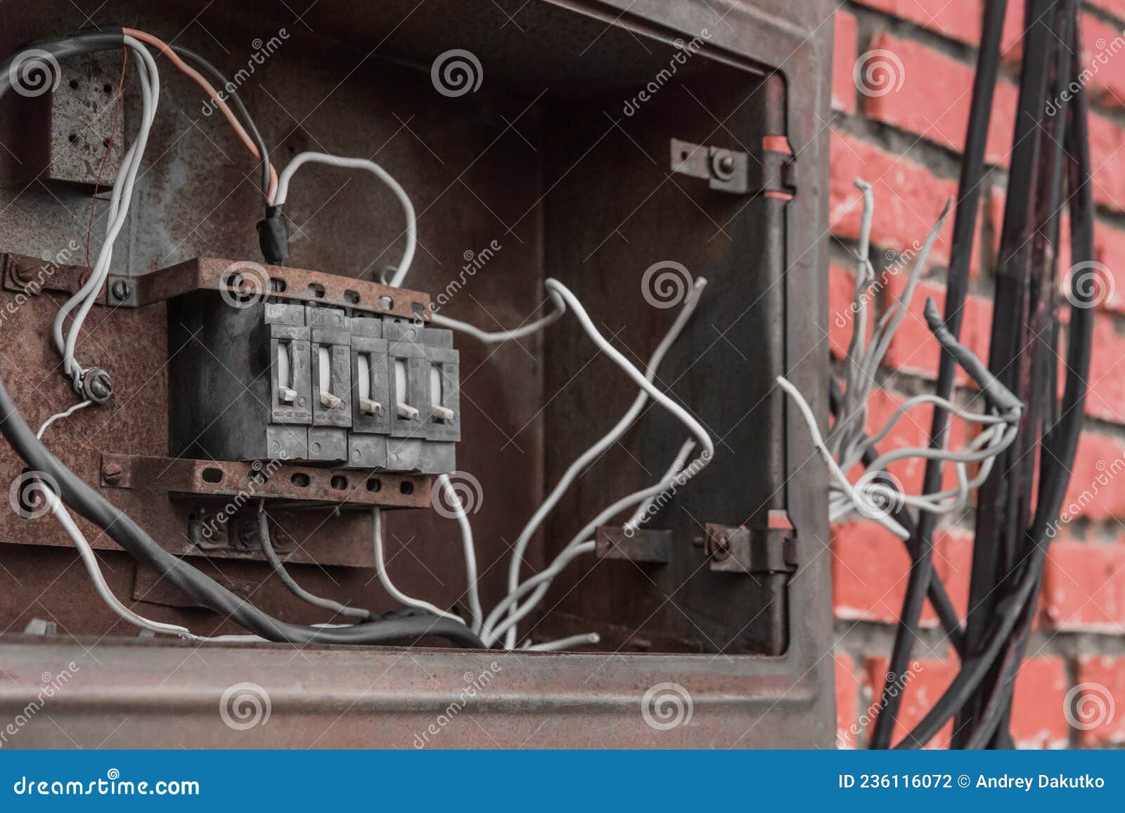 Niche Of An Old Broken Electrical Panel On The Background Of An Old Red ...