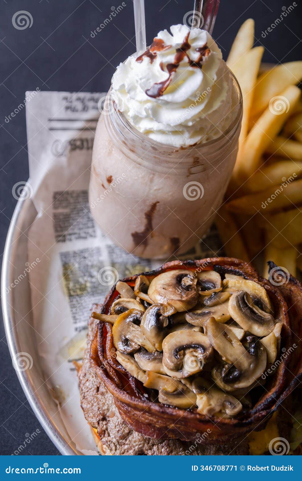 Gourmet Bacon Mushroom Burger with Fries and Chocolate Milkshake Stock ...