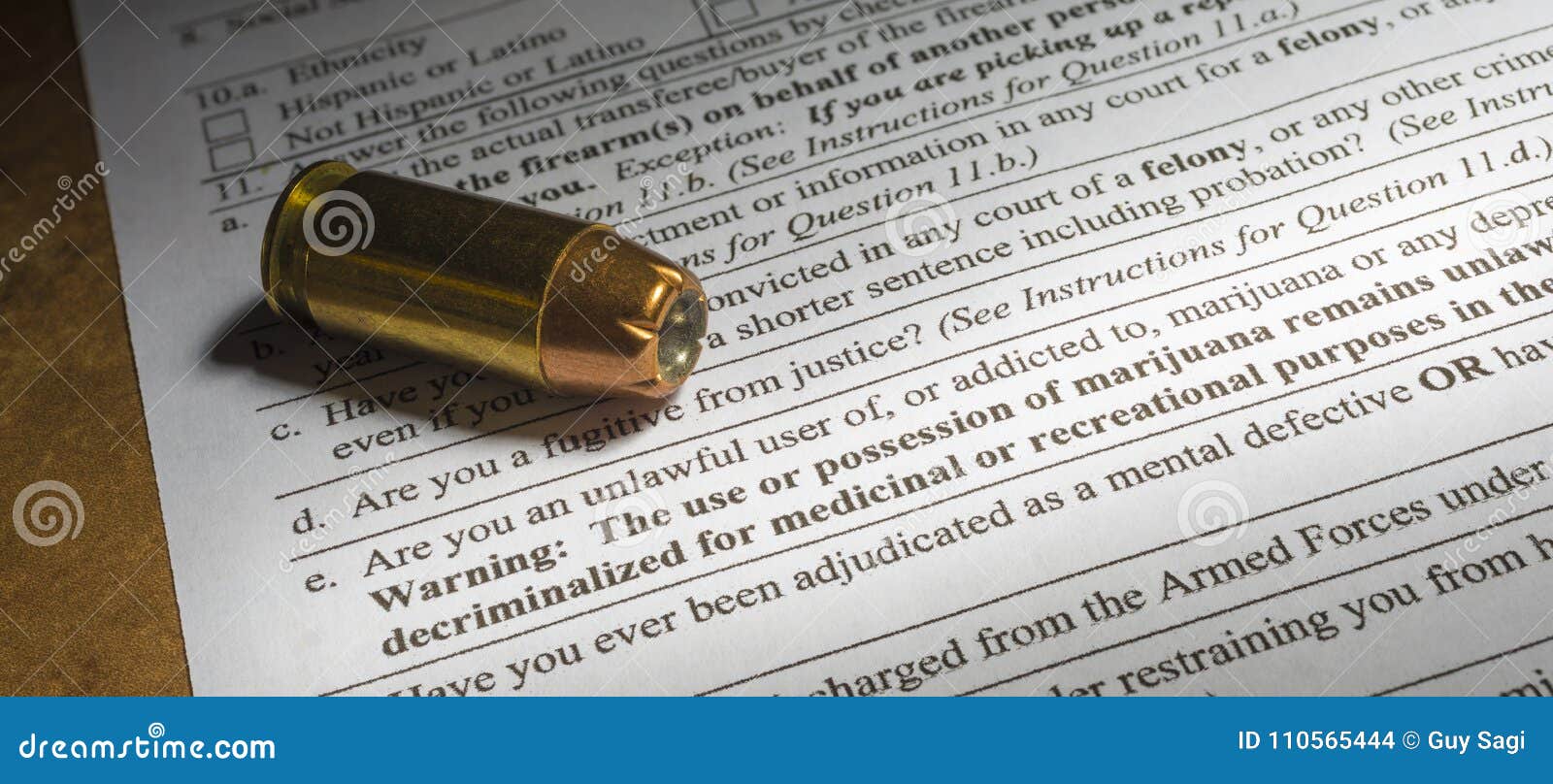 Fbi Nics Check Form That Is Public Domain With A Brown Polymer Handgun