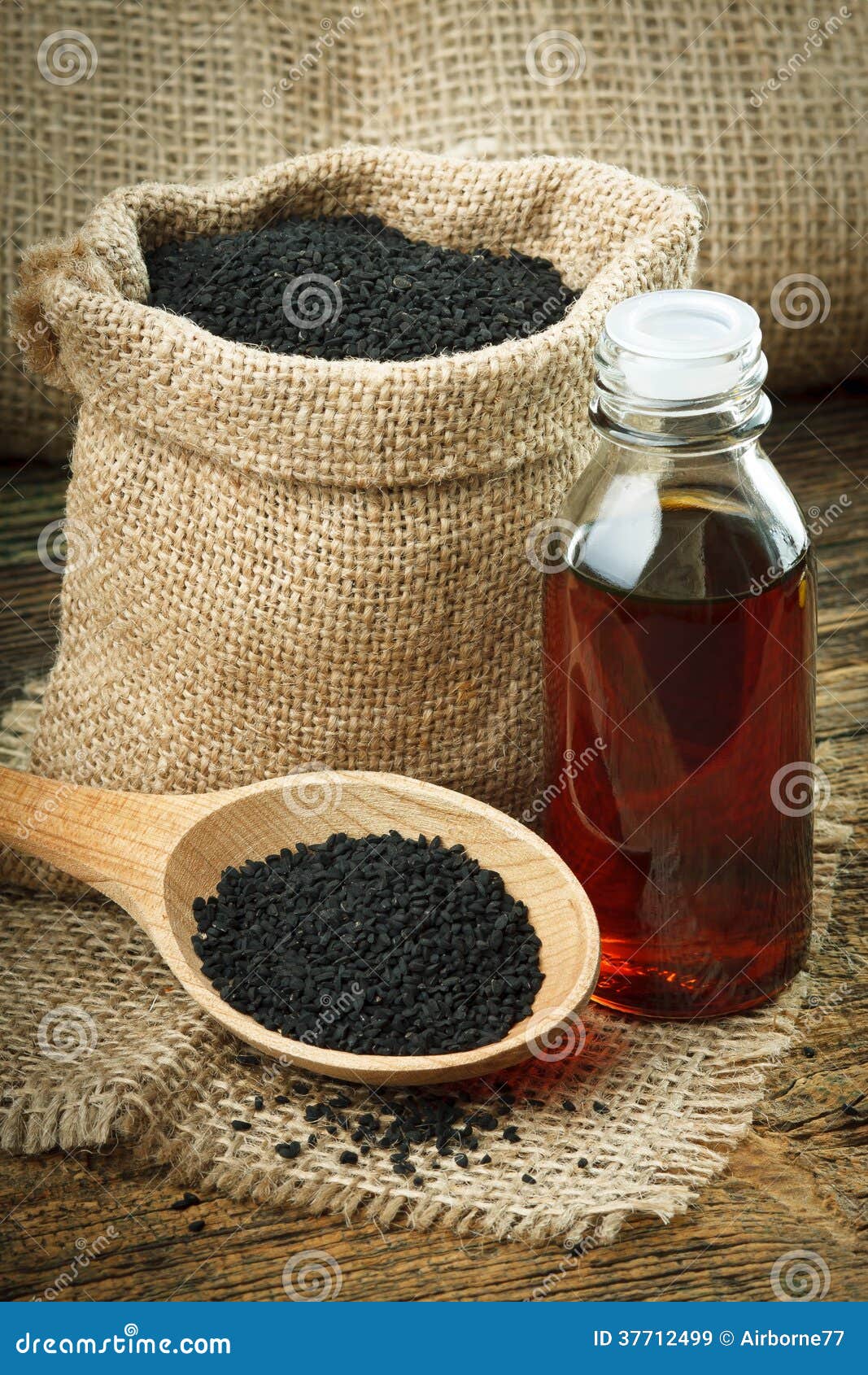 Nigella sativa oil stock image. Image of health, caraway - 37712499