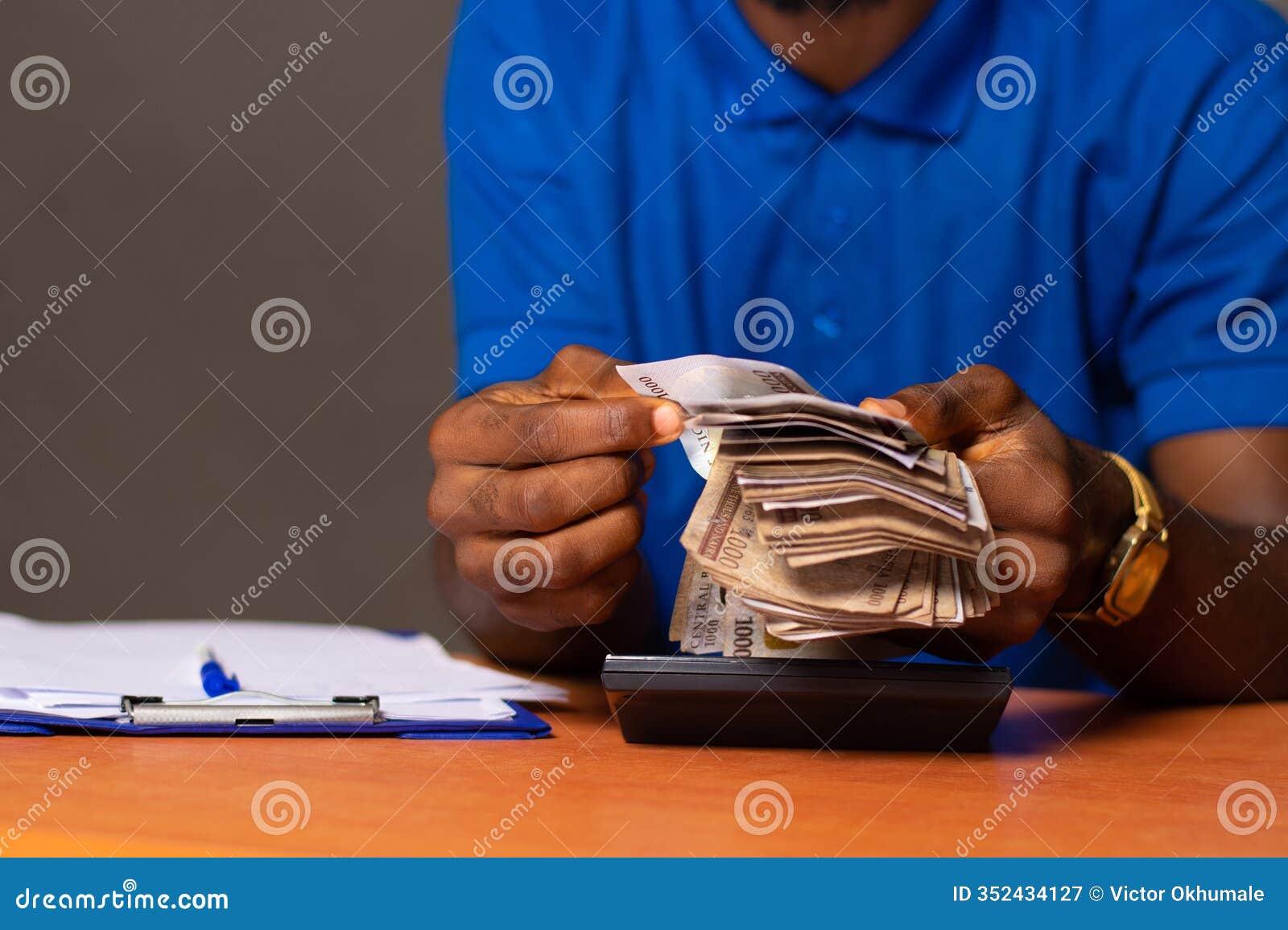 Nigerian Man Counting Some Money Stock Image - Image of earning ...