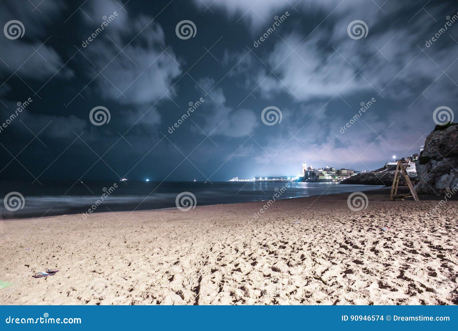 Night beach cloudy sky stock photo. Image of lights, city - 90946574