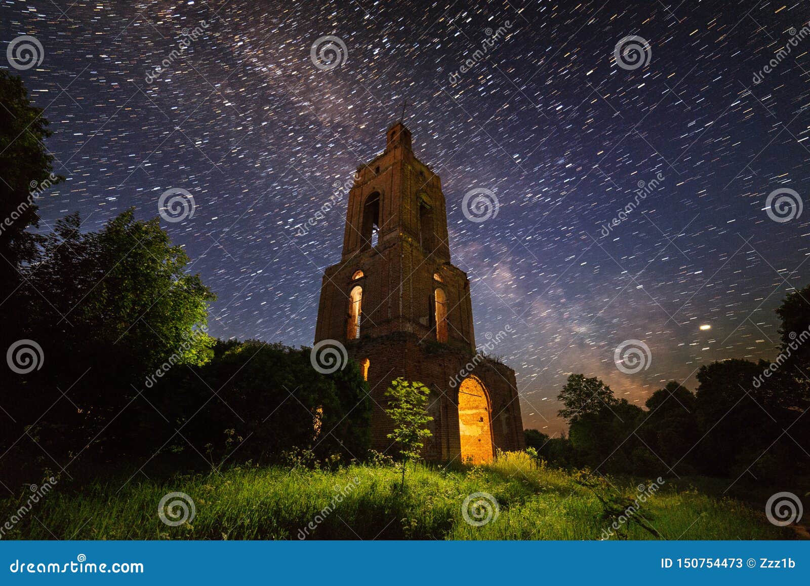 Night Bell Tower Ruin in Forest at Starry Night with Internal Light ...