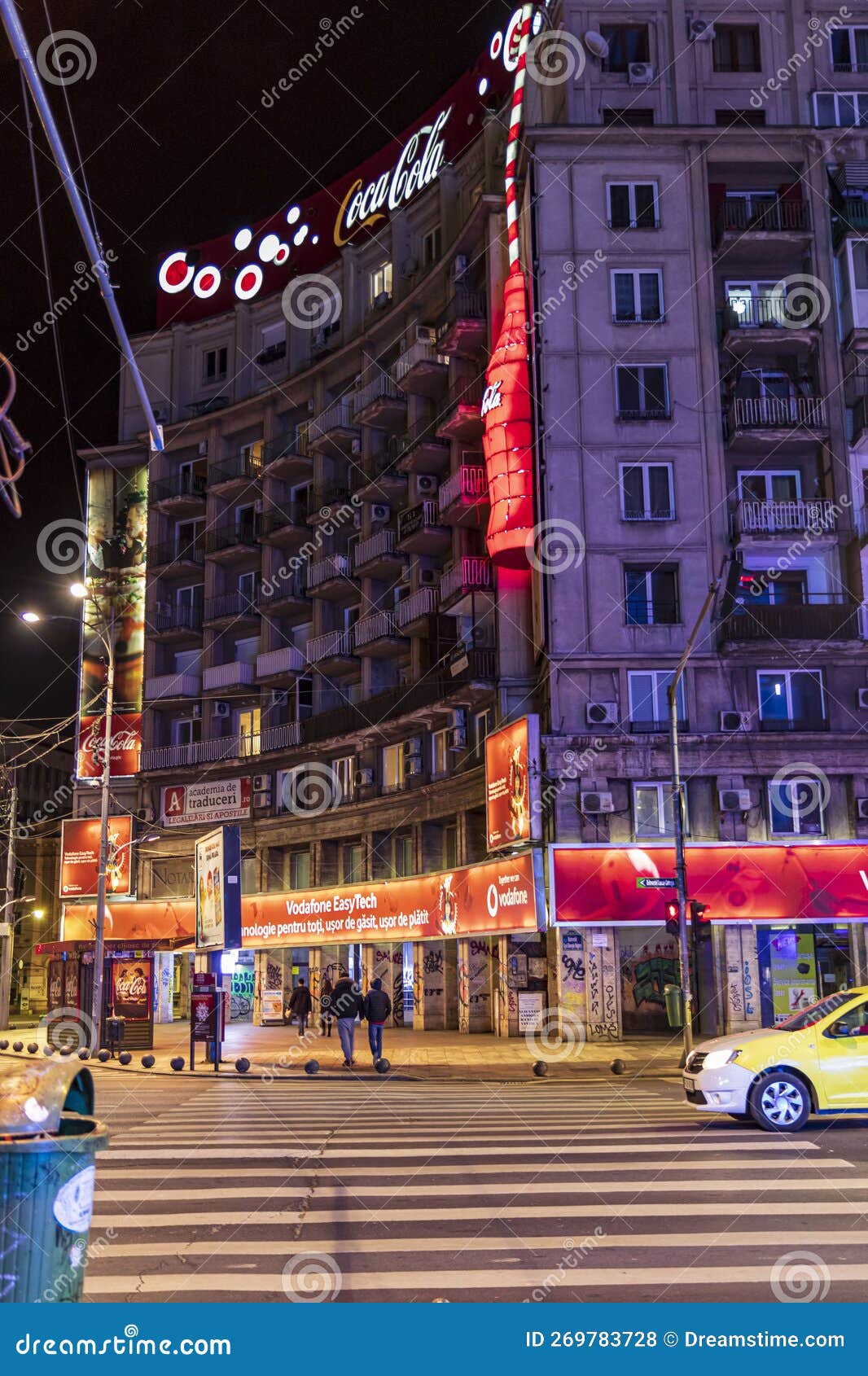 Night Boulevard with Illuminated Advertisements in Bucharest Editorial ...