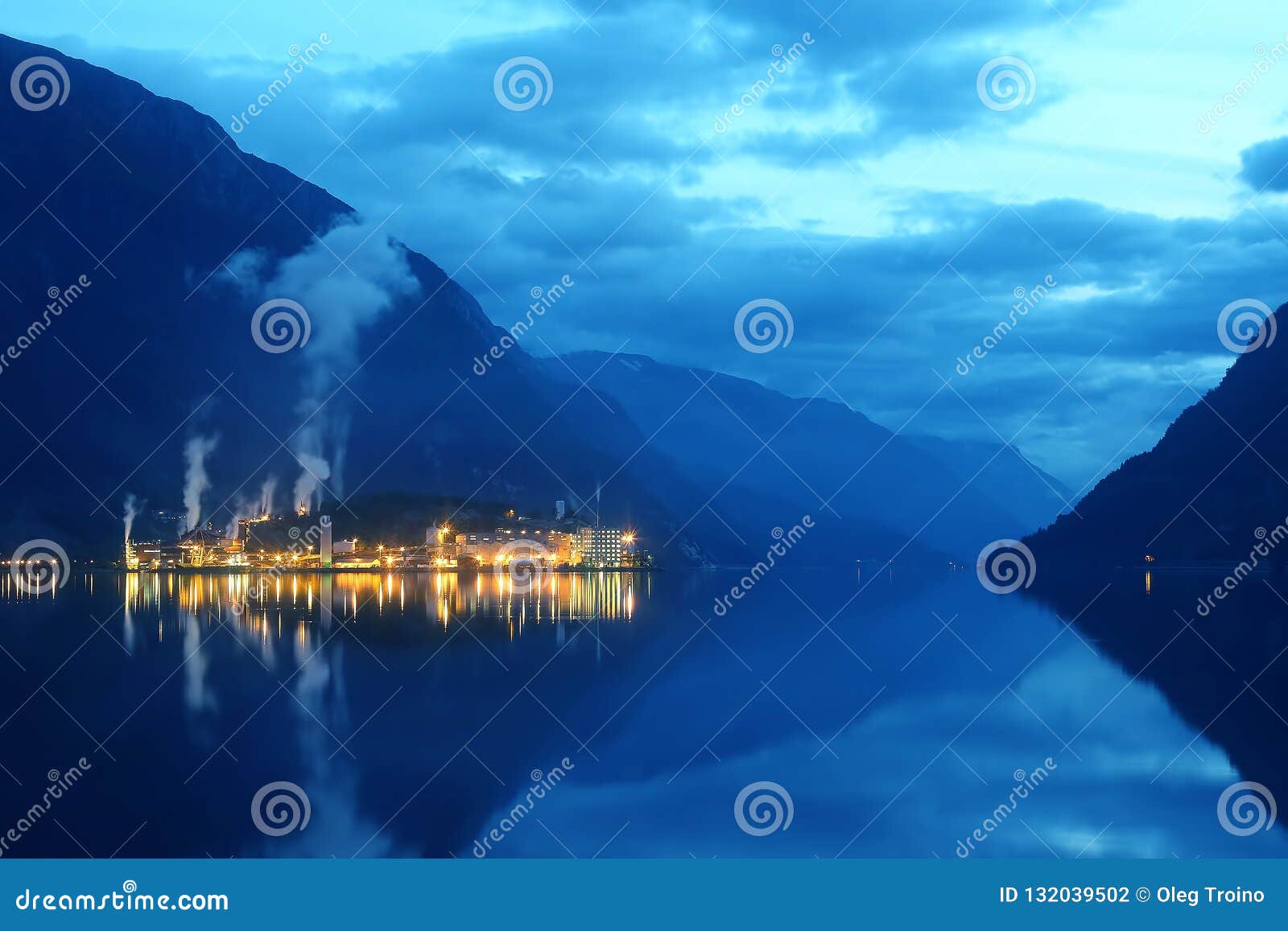 Night City Odda in the Reflection of Water. Norway Stock Photo - Image ...