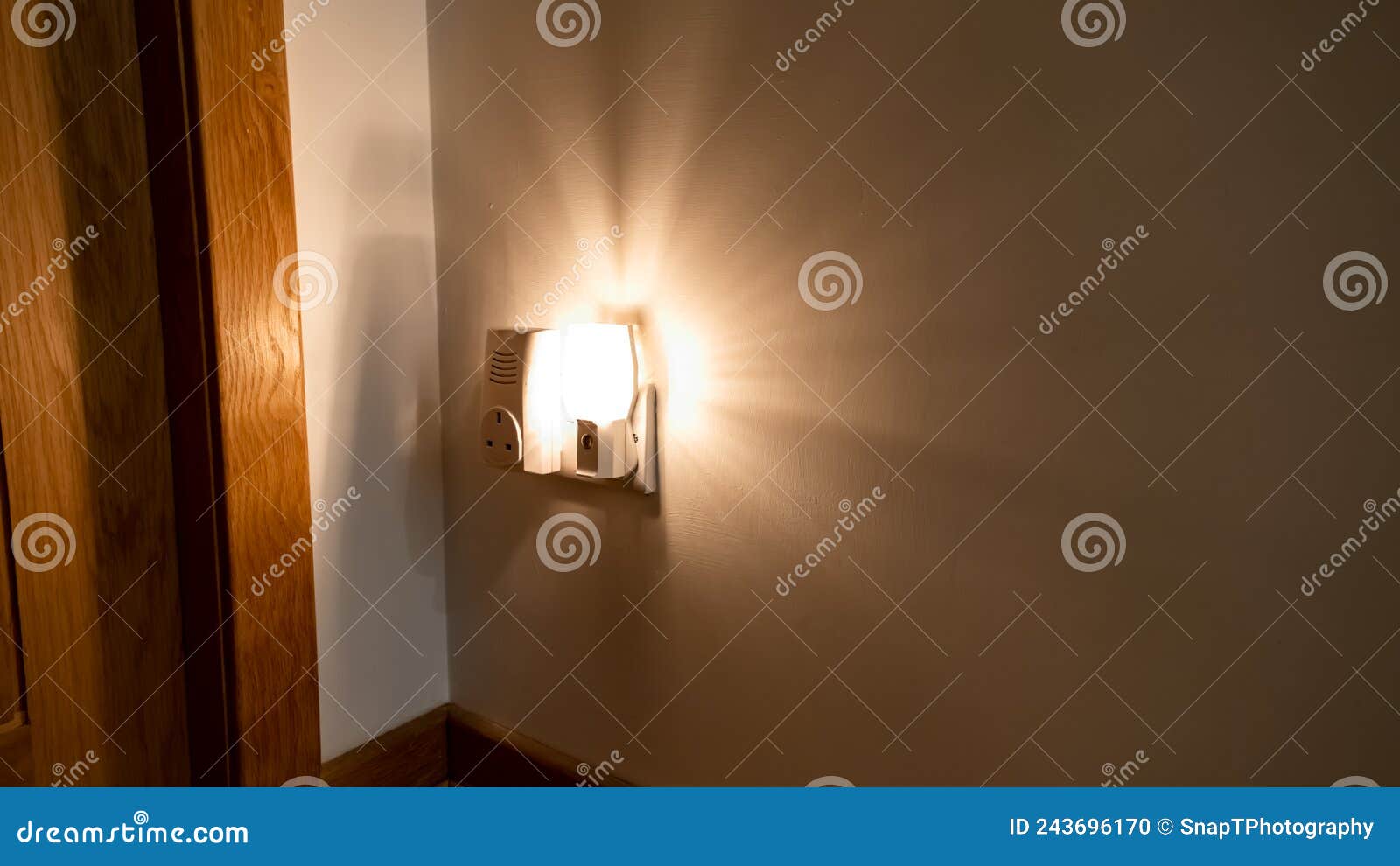 Night Light Plugged into a Wall in a House Stock Photo - Image of ...