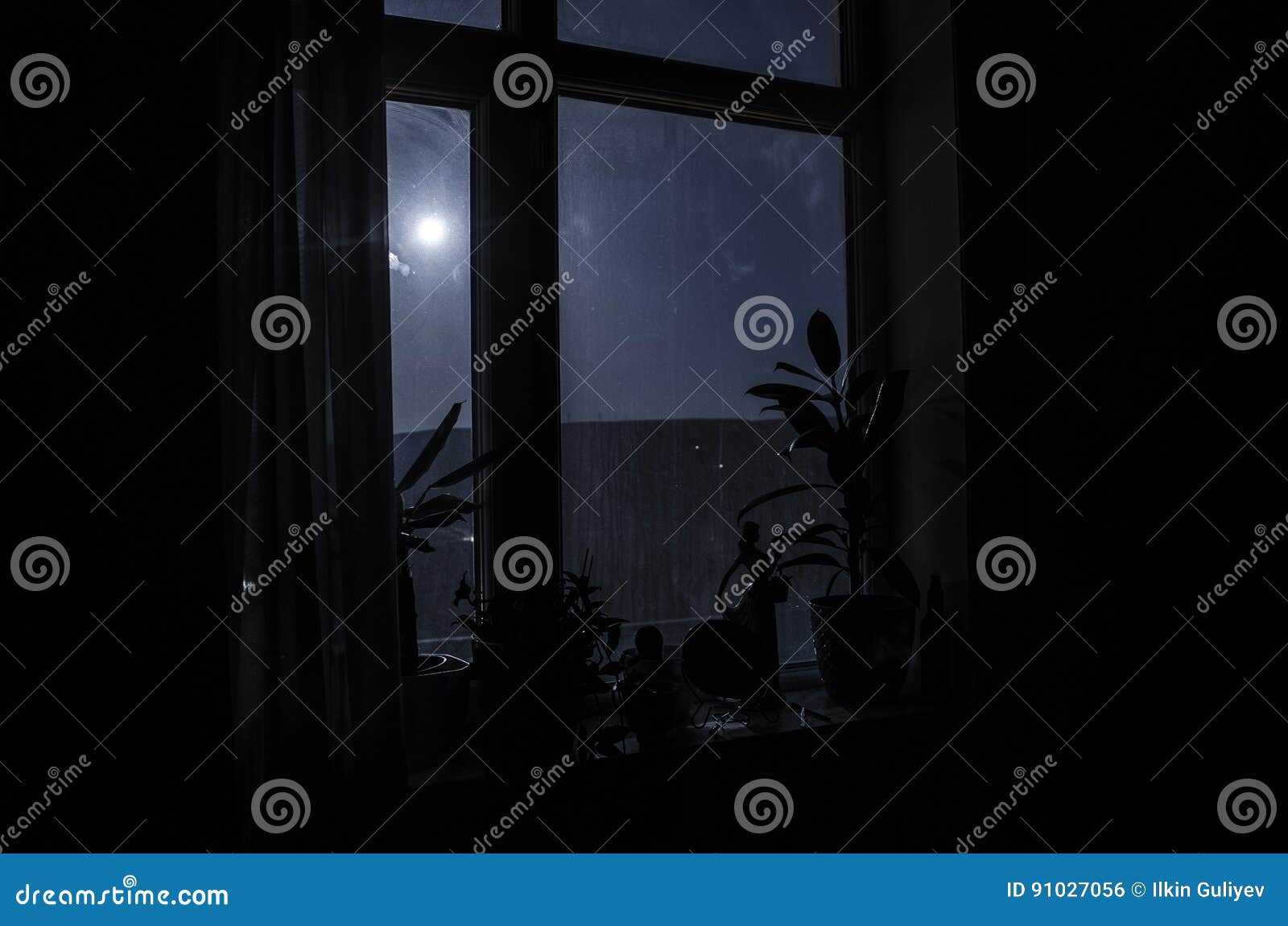 Night Scene of Moon Seen through the Window from Dark Room Stock Photo ...