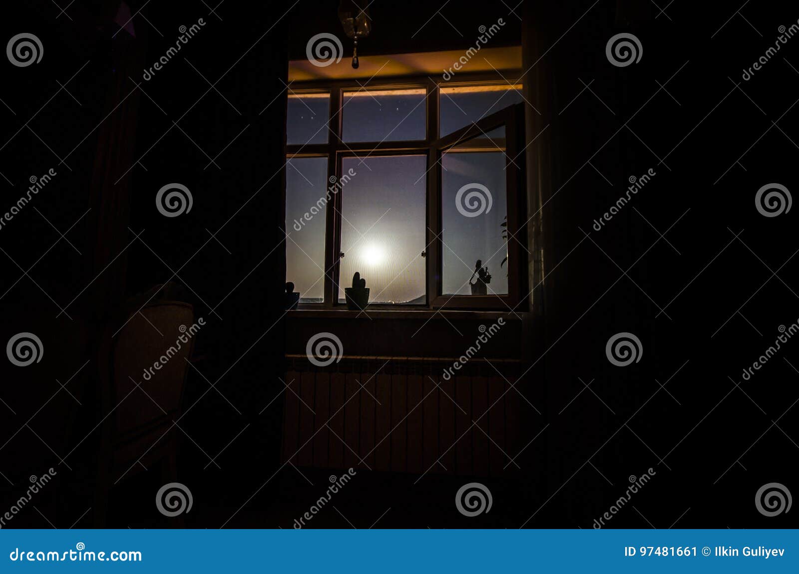 Night Scene of Moon Seen through the Window from Dark Room. Stock Image ...