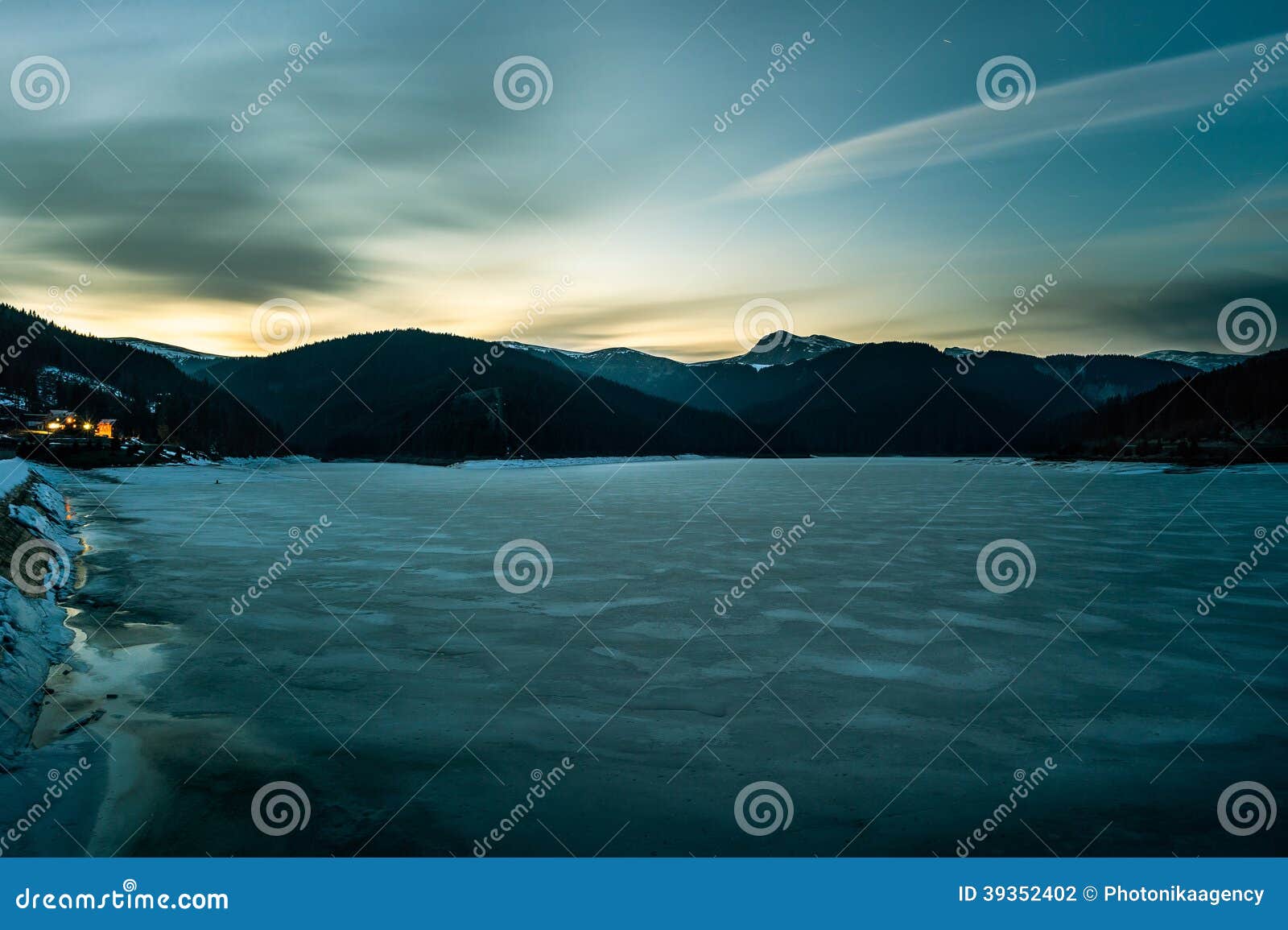 Night Scenery with Frozen Lake and Mountains Under the Sky Stock Photo ...