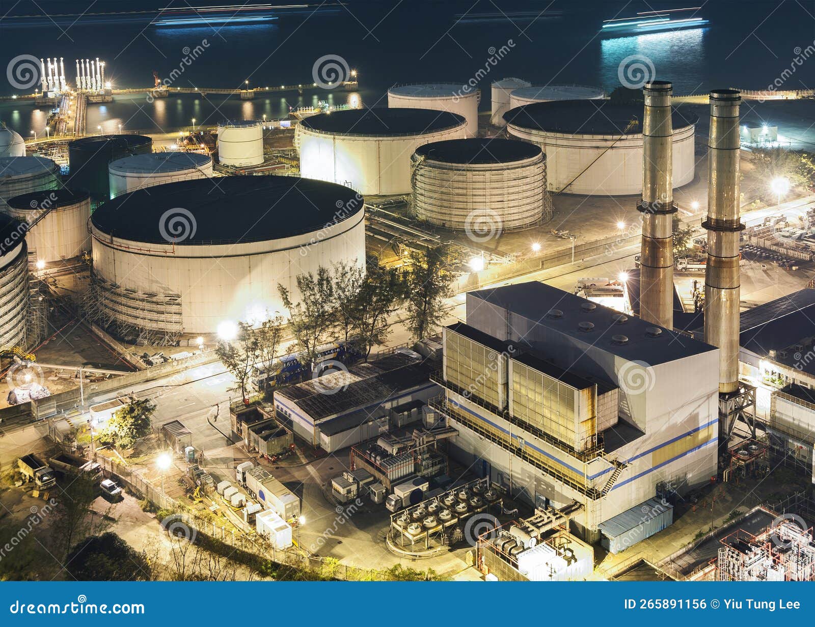 Power plant at night editorial photo. Image of industry - 265891156