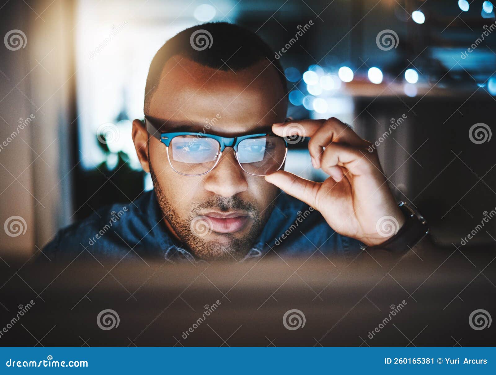 Night Shift Mode - on. a Young Businessman Using a Computer during a ...