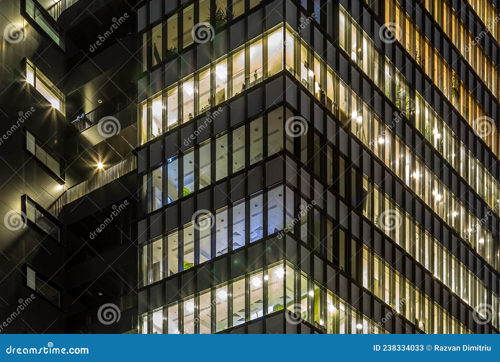 Night Shift in an Office Building with Lighted Windows Stock Image ...