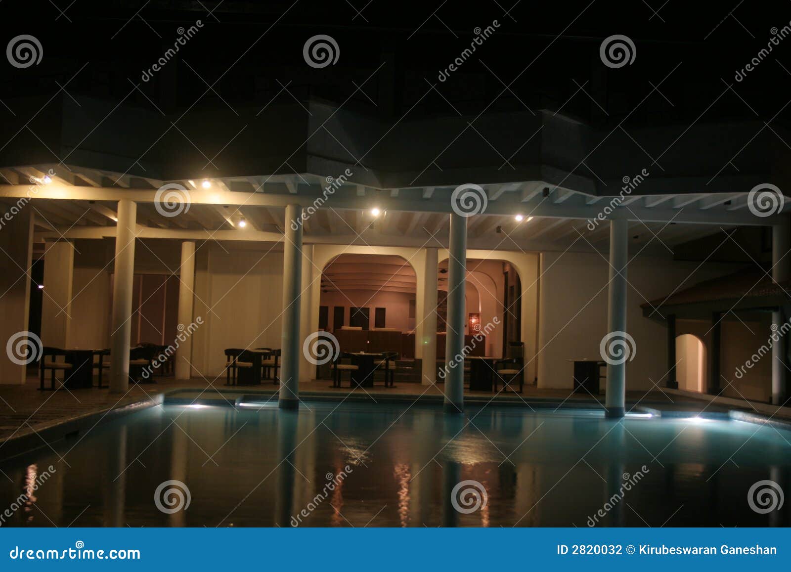 Night Shot of Swimming Pool in Stock Photo - Image of houses ...