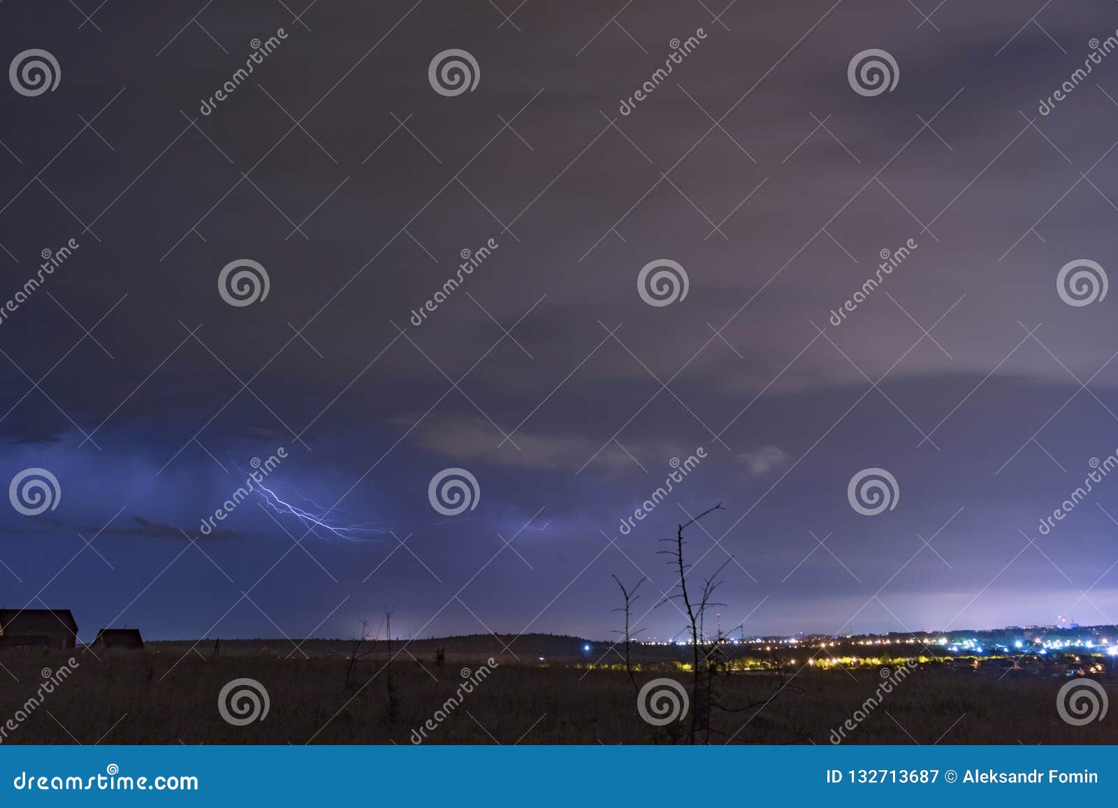 Night Sky with Clouds and Lightning Over a Small Town Stock Image ...