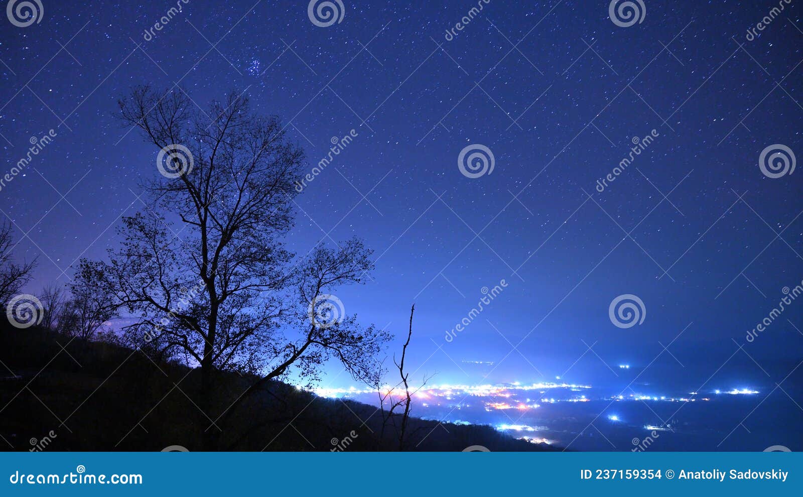 Night Sky Over Small Town in Mountains Stock Photo - Image of outdoor ...
