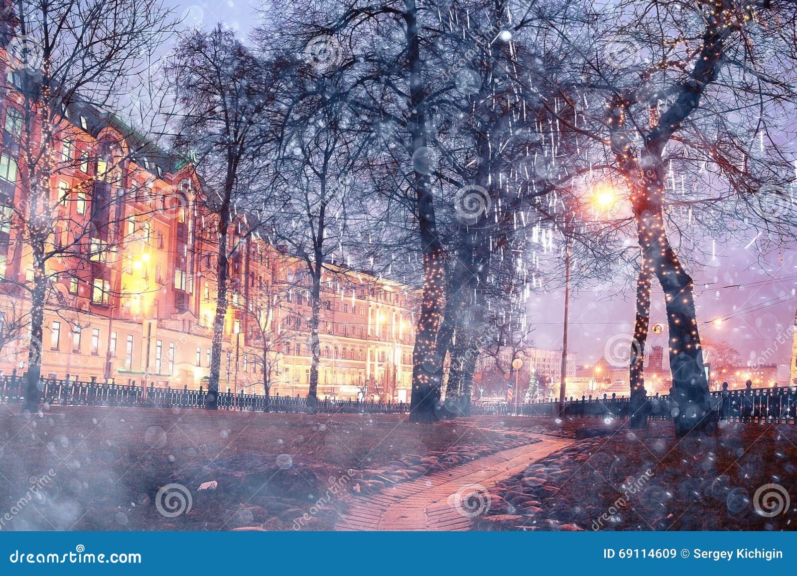 Night snowfall in old town stock image. Image of magic - 69114609