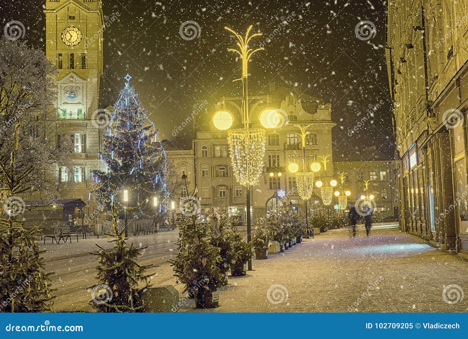 Night Snowy Town Square with Chrismas Tree and Decoration Stock Image ...