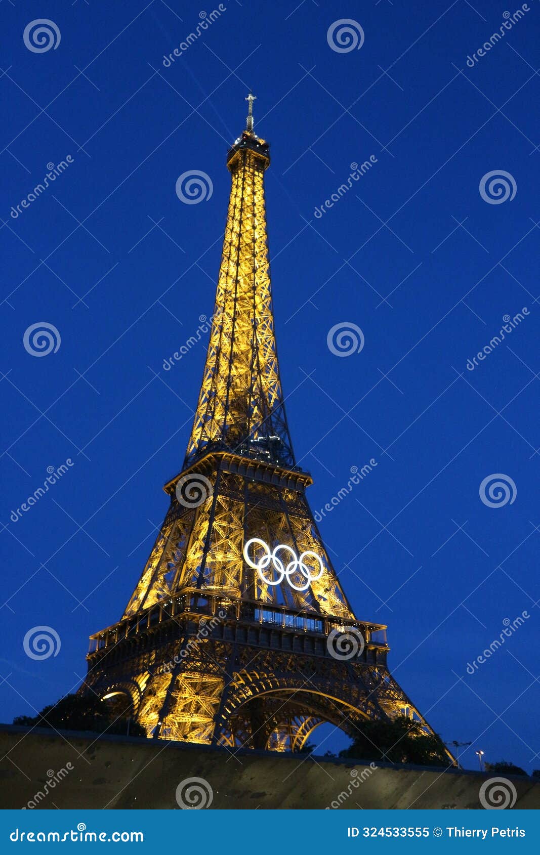 Night Time View of the Eiffel Tower with Olympic Rings Stock Image ...