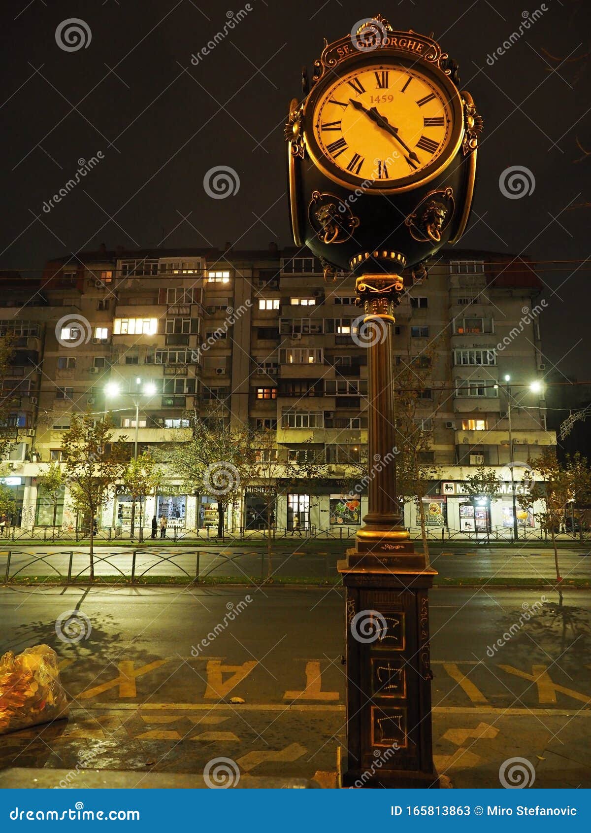 Night View of the Clock and Downtown Bucharest with an Interesting ...