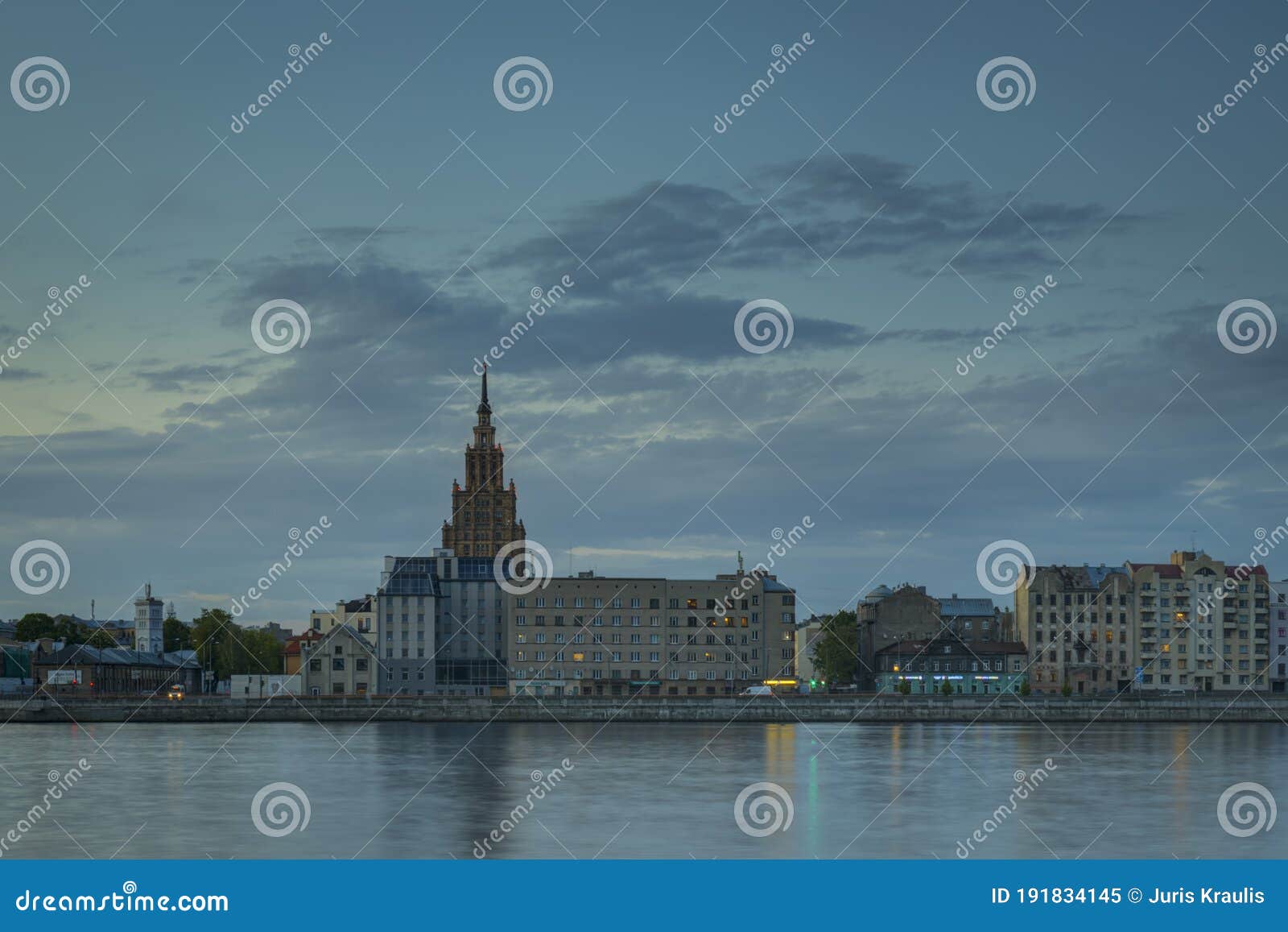 Night View on the Illuminated Riverside with Reflection on the River in ...