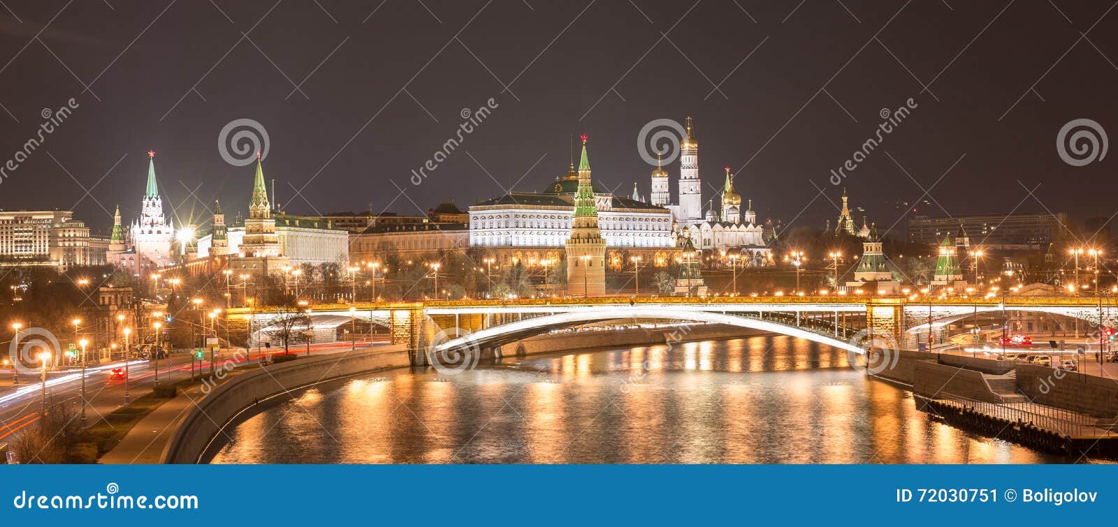 Night View of Moscow Kremlin with a Bridge and River Reflections Stock ...