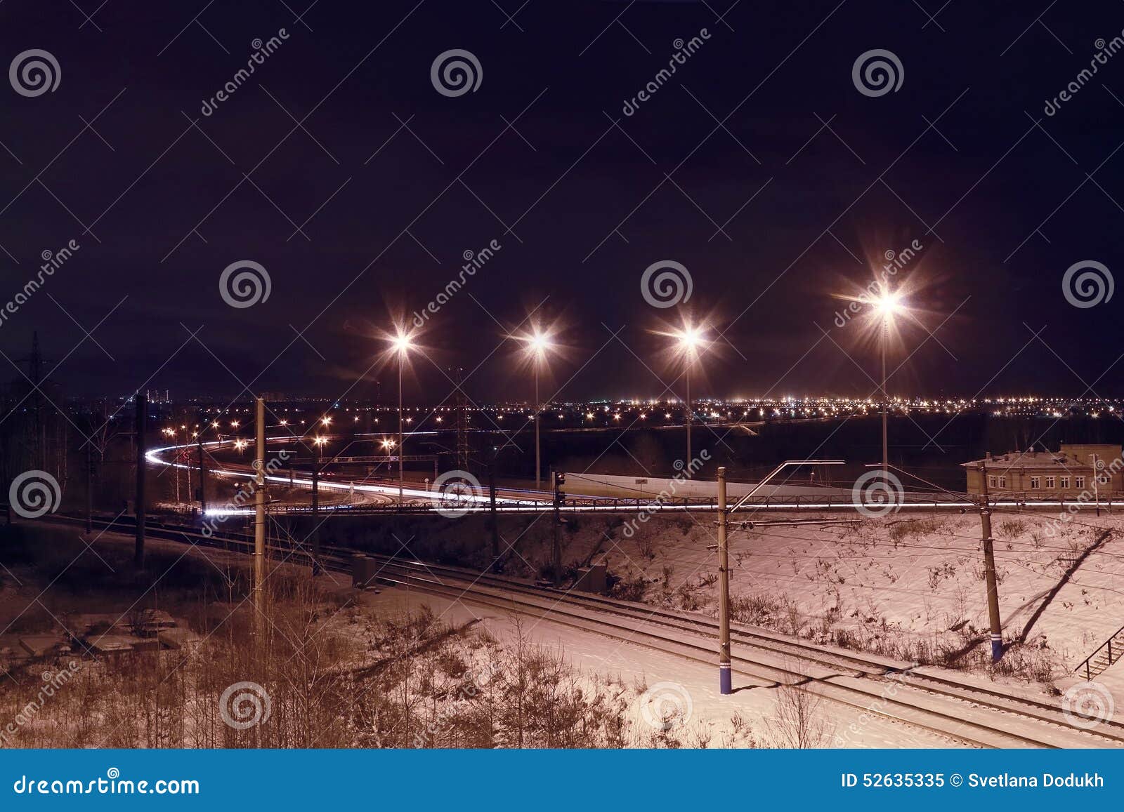 Night View of Railroad with Lanterns and Lights of City Stock Image ...