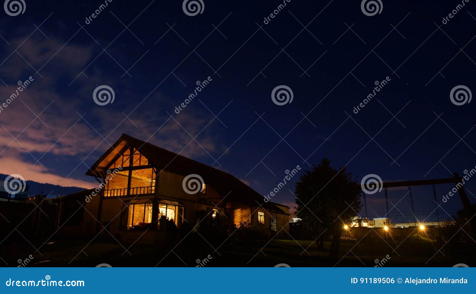 Night View of a Rustic House with Lights on Stock Photo - Image of ...