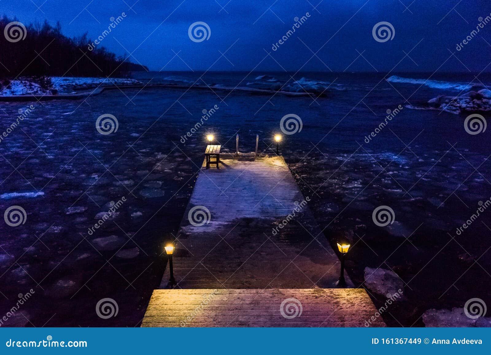 Night Winter Seascape with a Pier and Ice in the Water Stock Image ...