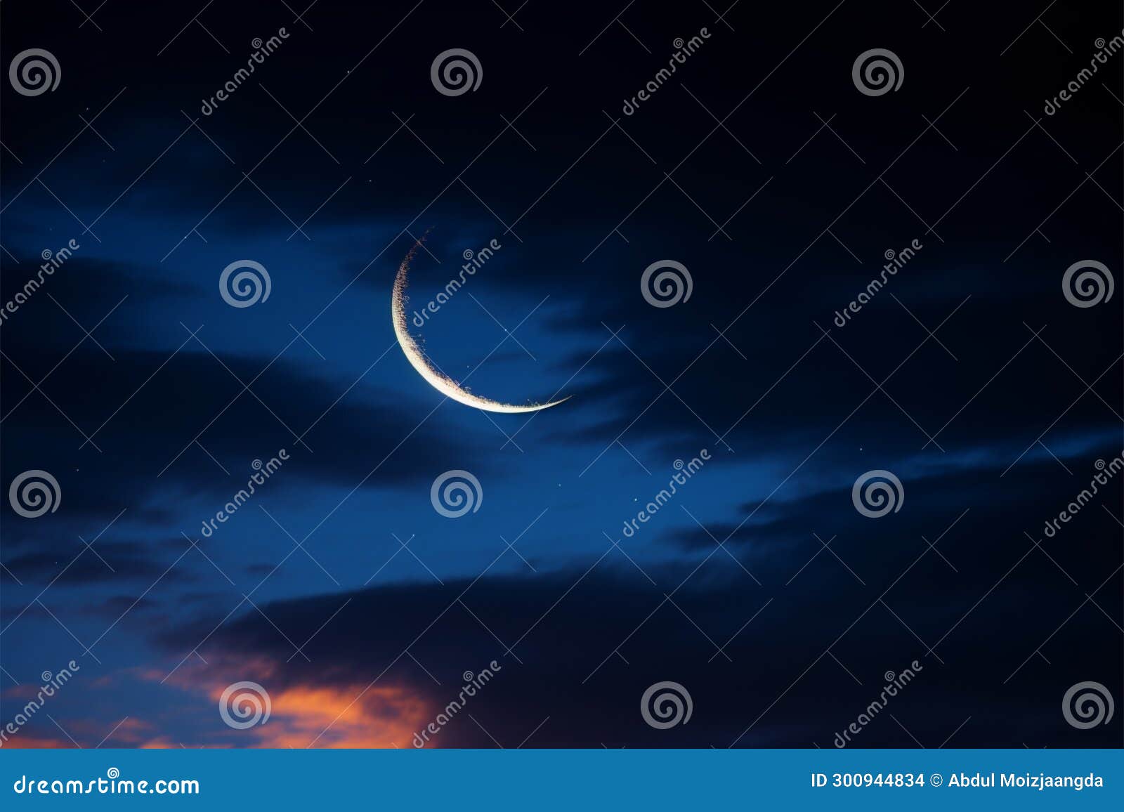 Nightfall Elegance Half Moon on Display in the Early Evening Stock ...