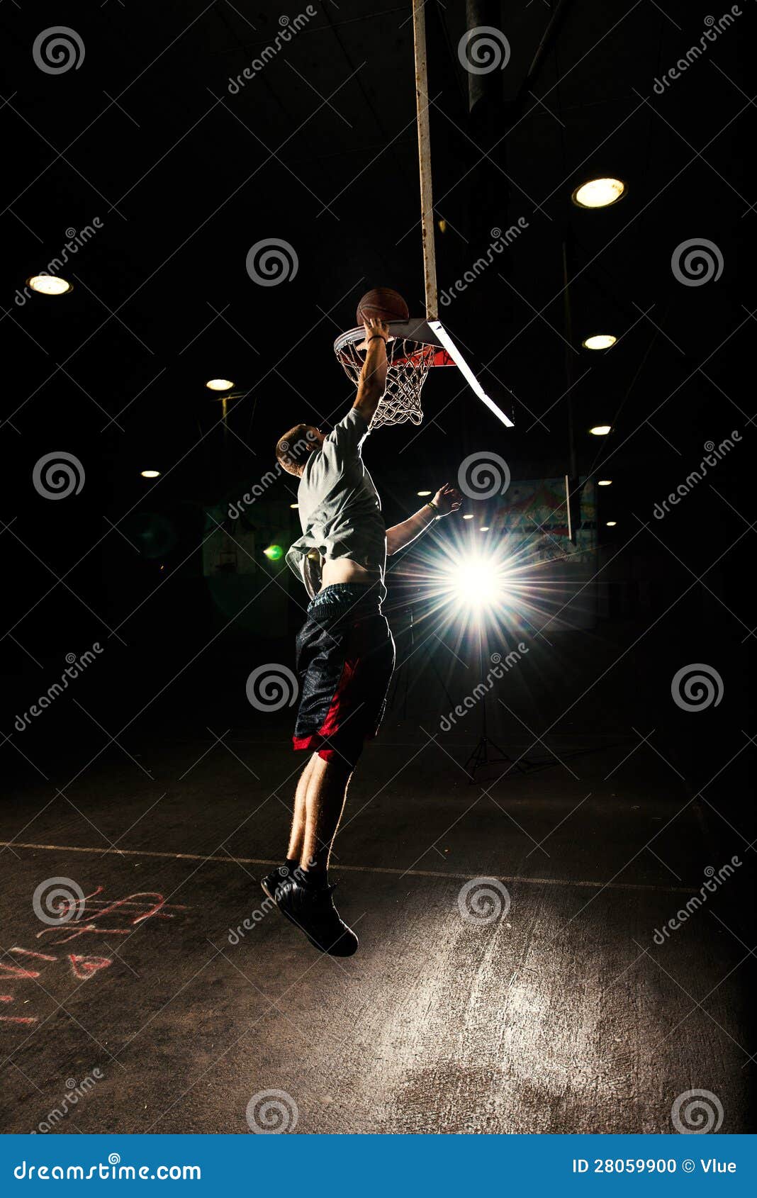 Nighttime Basketball Player Stock Photo - Image of play, person: 28059900