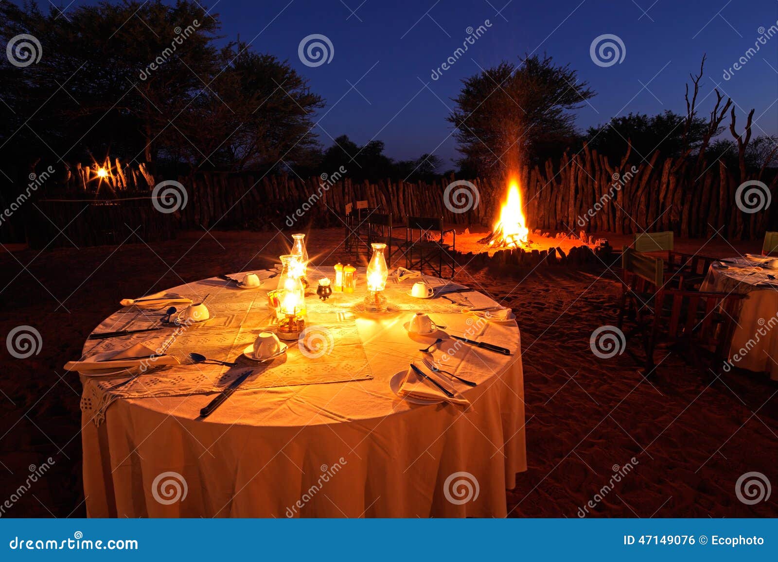 Nighttime Campfire and Table Stock Photo - Image of fire, outdoors ...