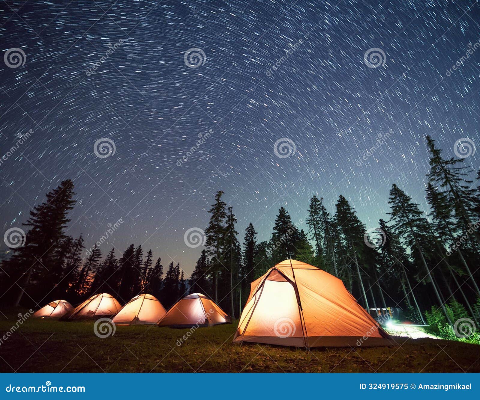 Nighttime Camping in the Forest with Lit Tents and Starry Sky Stock ...