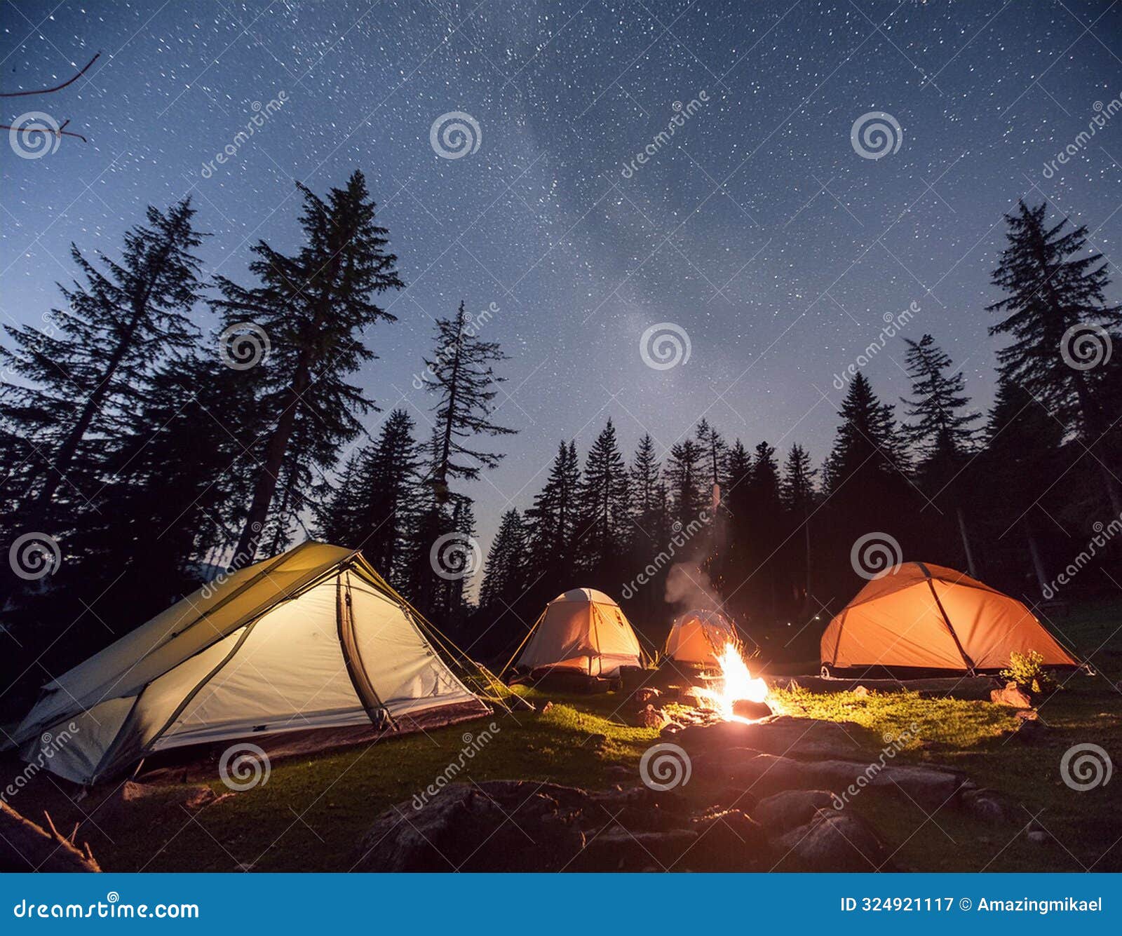 Nighttime Camping in the Forest with Lit Tents and Starry Sky Stock ...