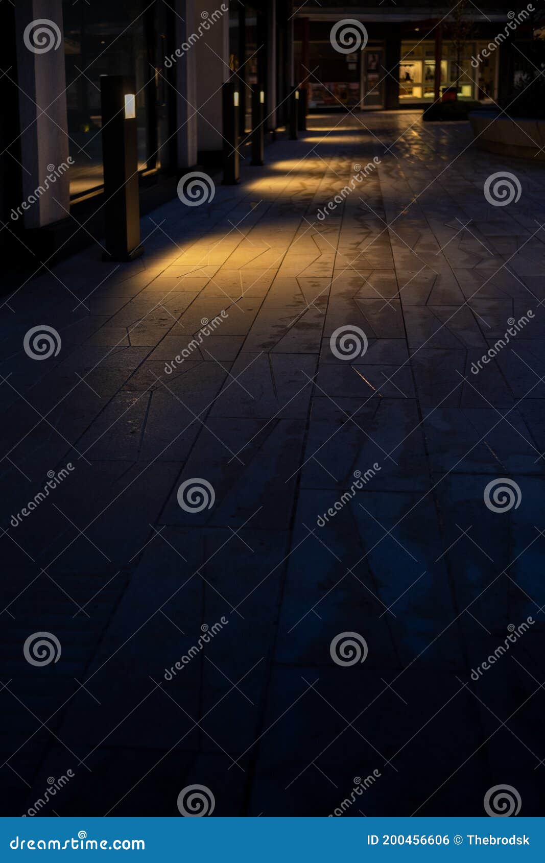 Nighttime Imge of Street Lighting Reflecting on Pavement or Sidewalk ...