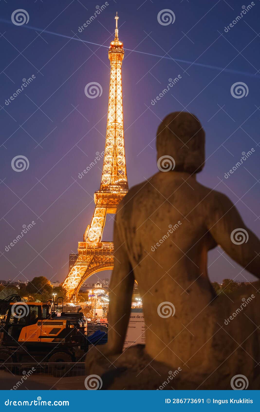 Nighttime Statue in Front of Illuminated Eiffel Tower Editorial Photo ...