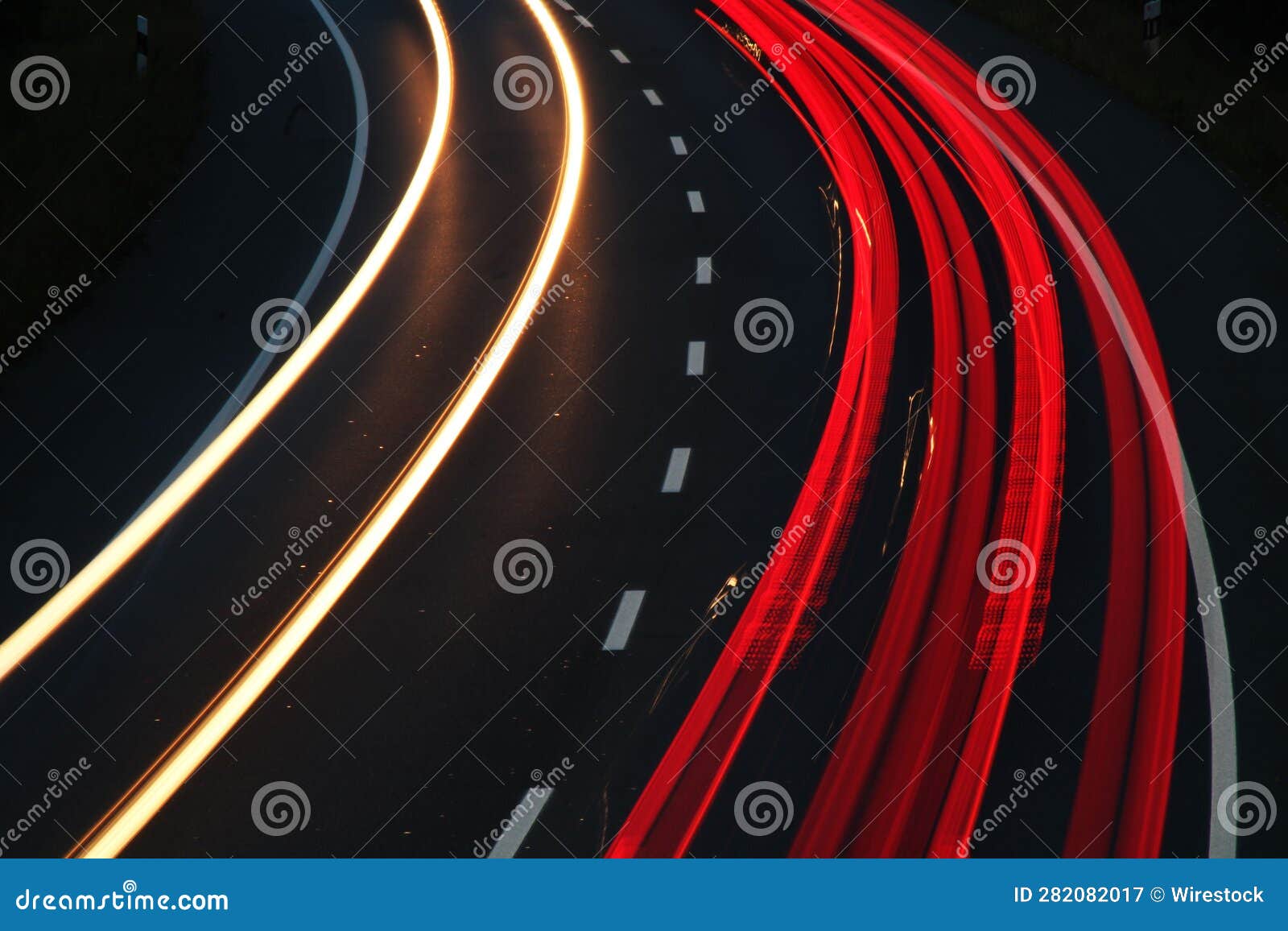 Nighttime Urban Landscape Illuminated by a String of Vibrant Red Light ...