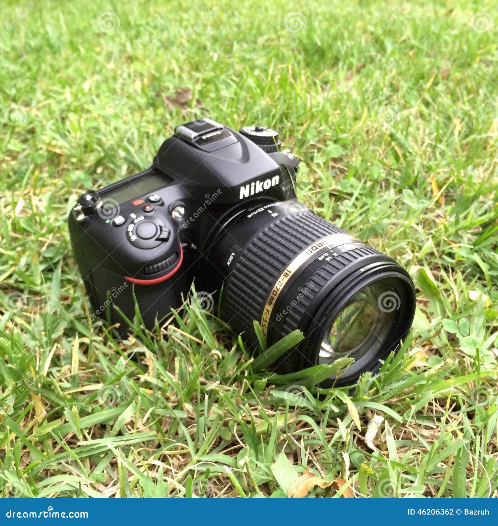 Nikon photocamera on grass editorial photography. Image of focus - 46206362
