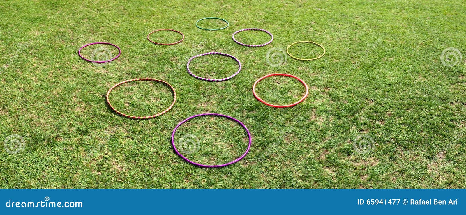 Nine 9 Hula Hoops on a Green Grass Stock Image - Image of healthy ...