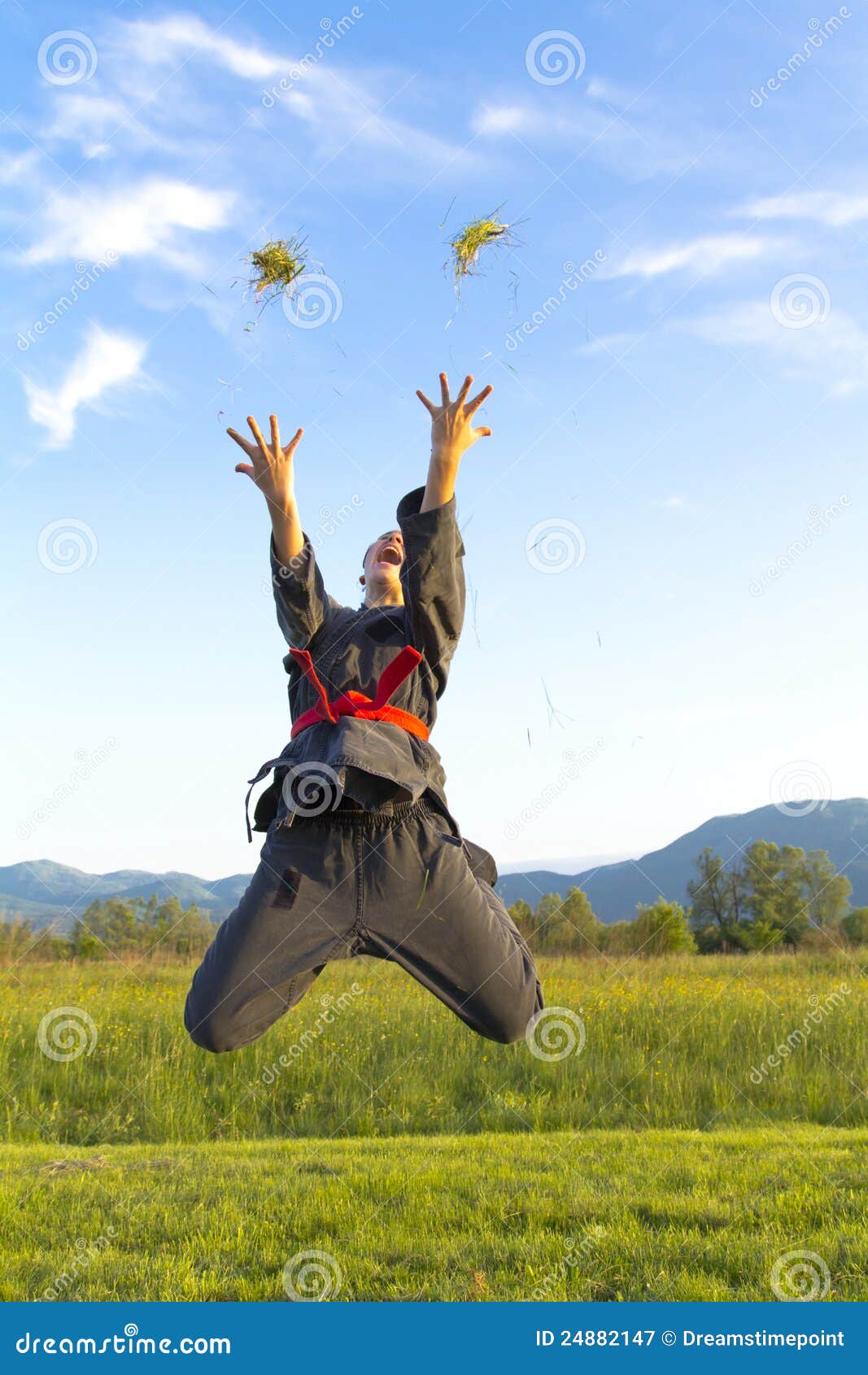 Ninja girl throwing grass stock image. Image of agility - 24882147