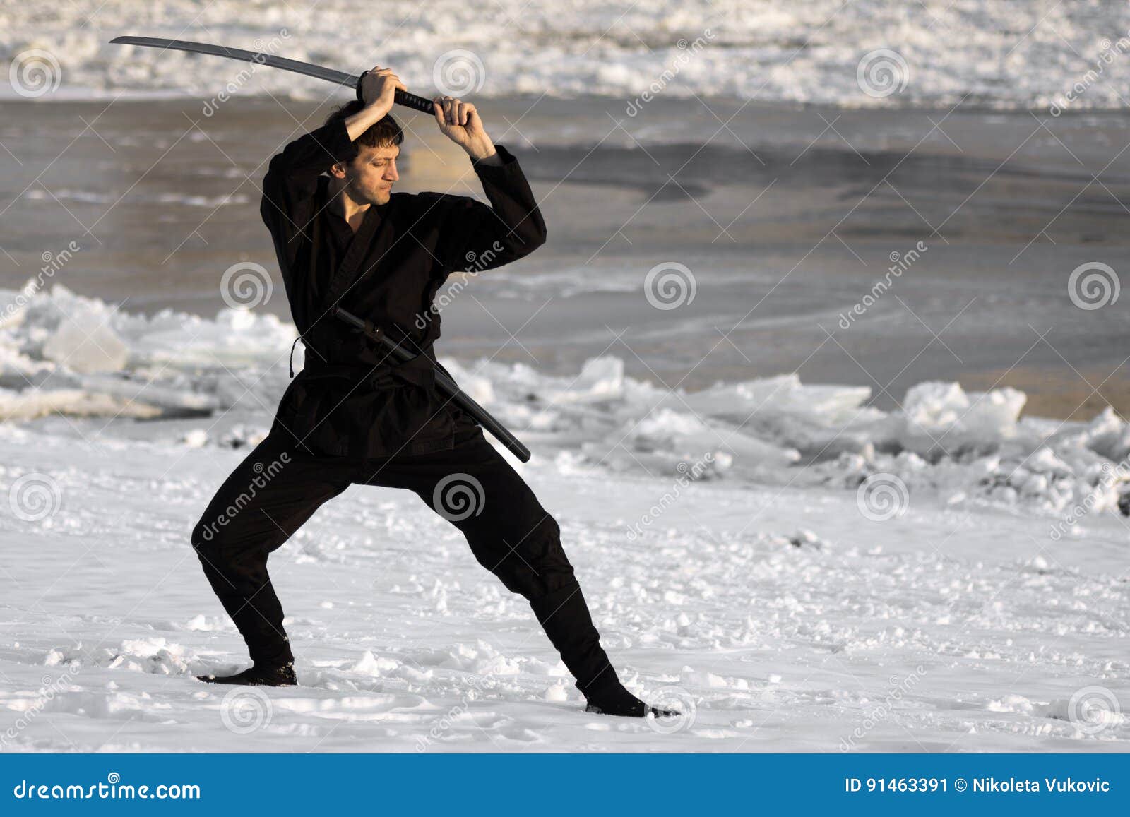 Ninja with sword at winter stock image. Image of sports - 91463391