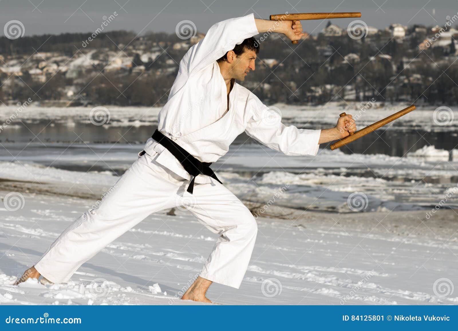 Ninja with tonfa in snow stock image. Image of martial - 84125801